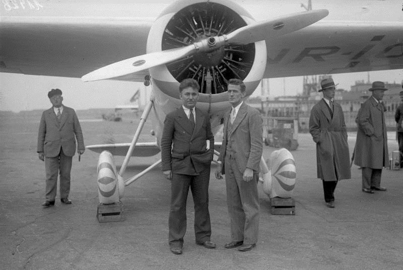 Pilot Wiley Post circles the earth to make aviation history